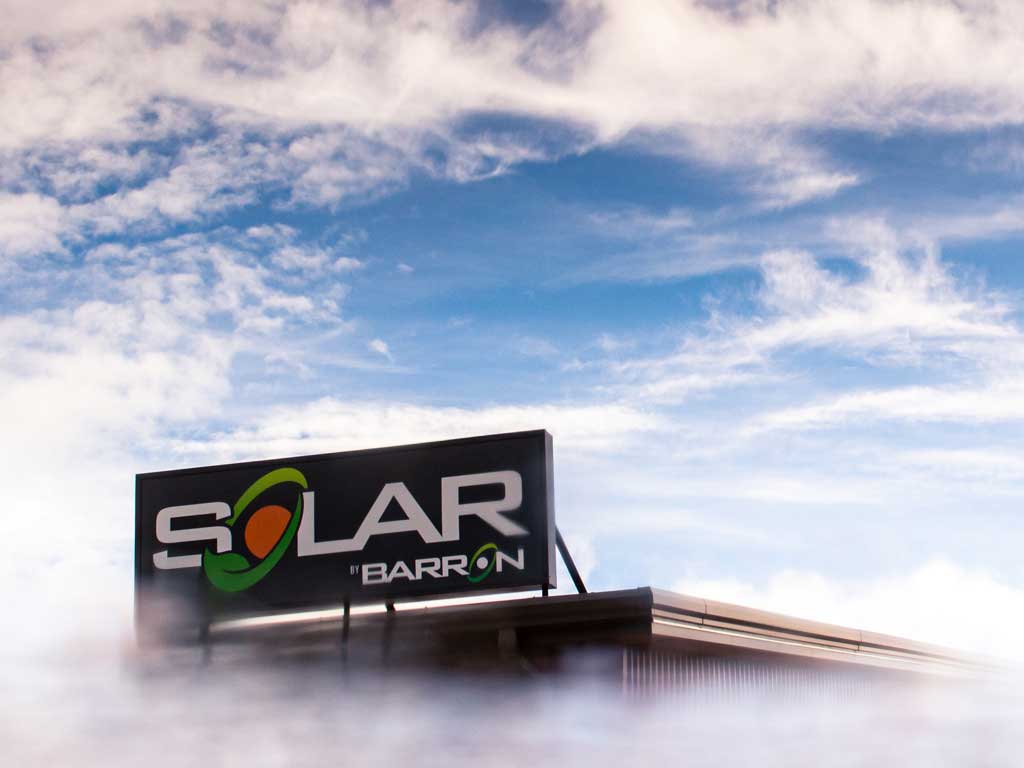 Scenes at the Solar Rooftop Sign Installation - Signs Plus